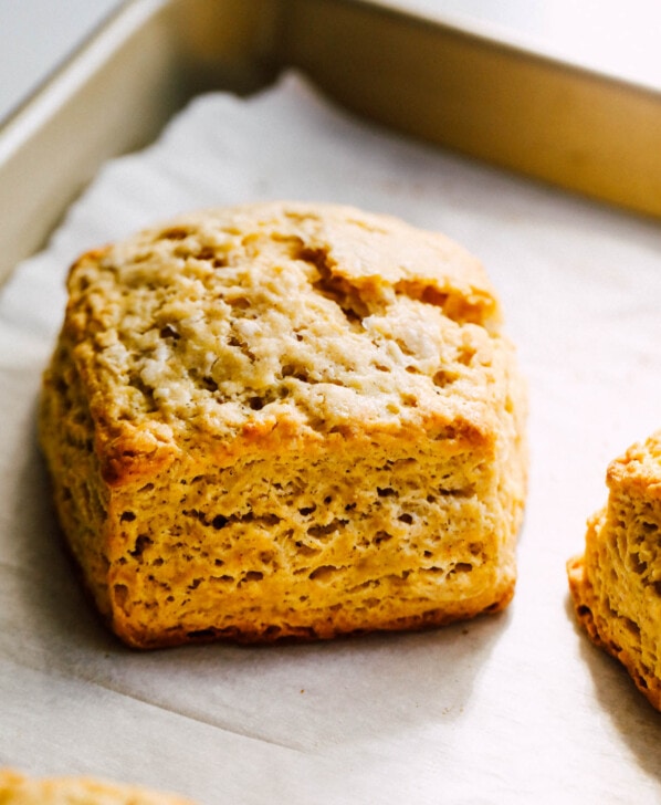 Flaky Sourdough Discard Pumpkin Scones with Maple Glaze