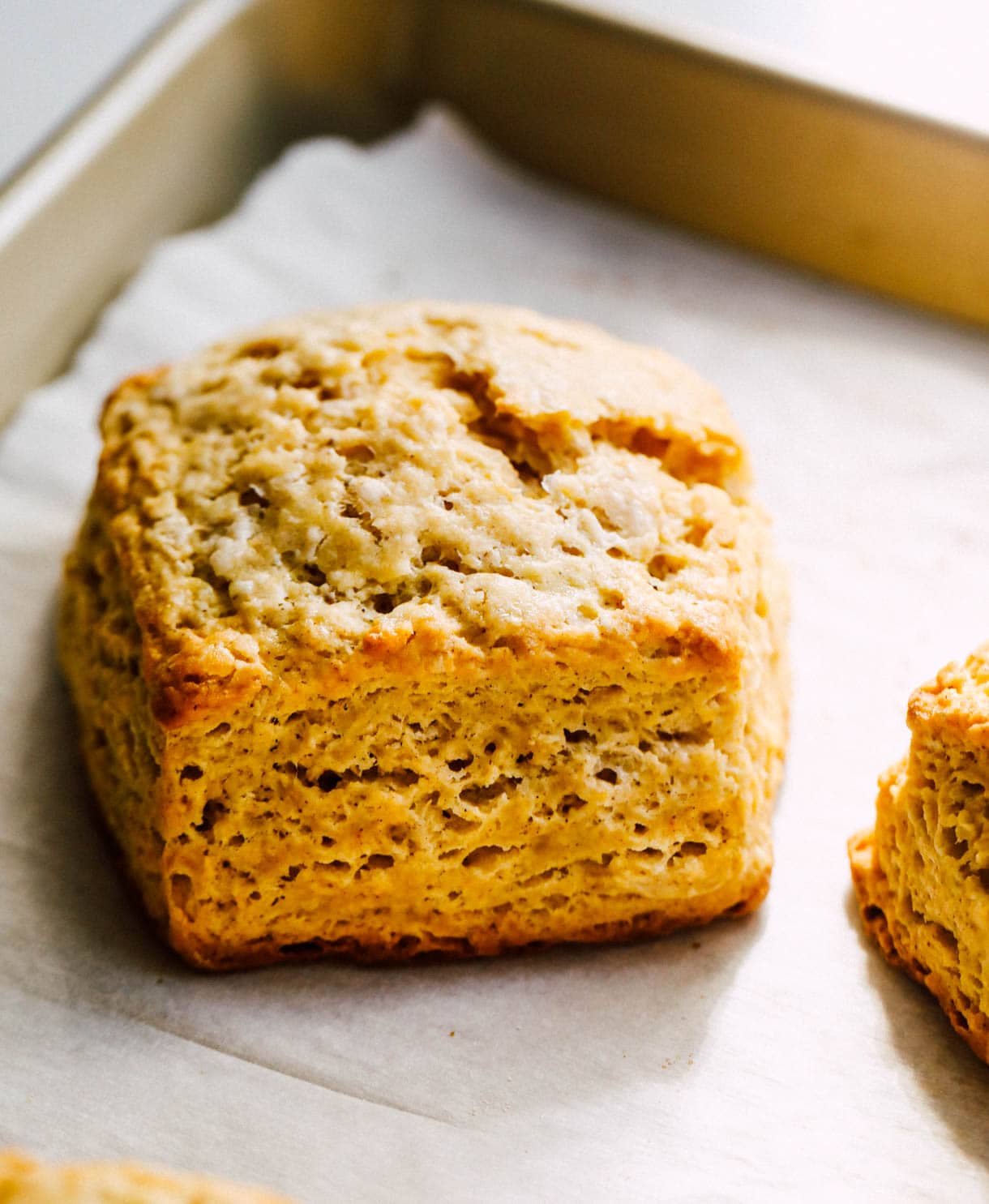 Flaky Sourdough Discard Pumpkin Scones with Maple Glaze