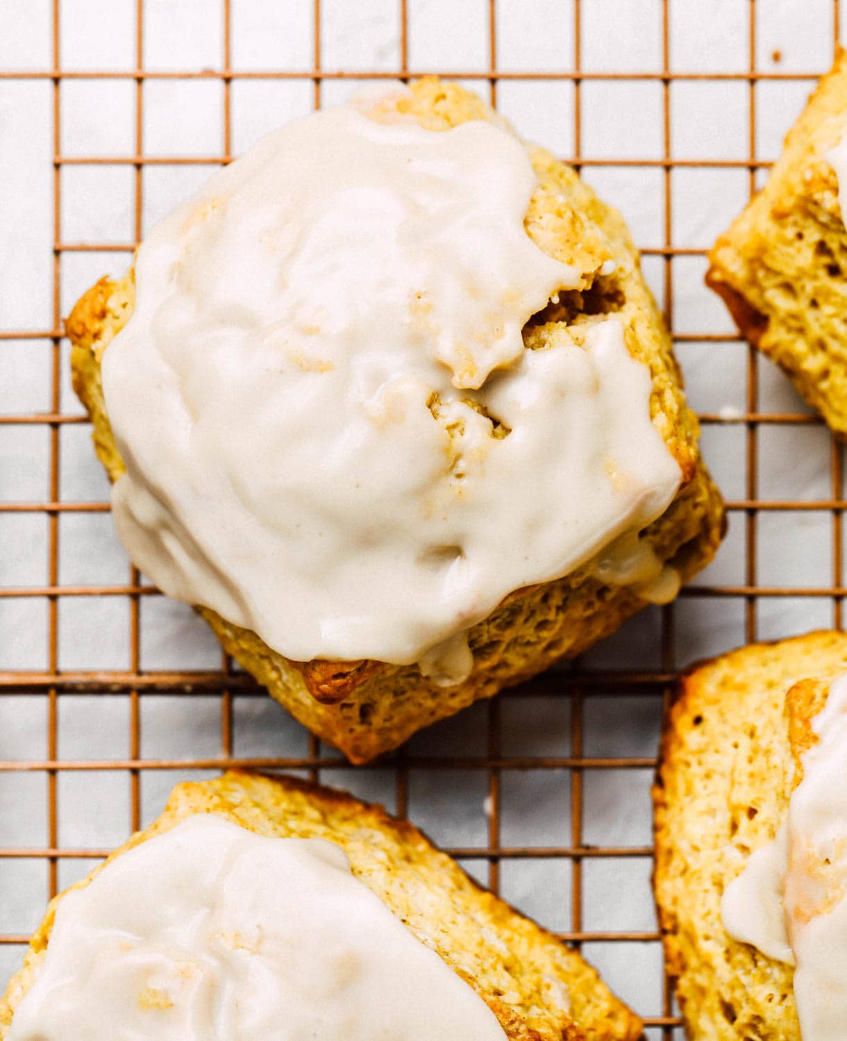 Flaky Sourdough Discard Pumpkin Scones with Maple Glaze
